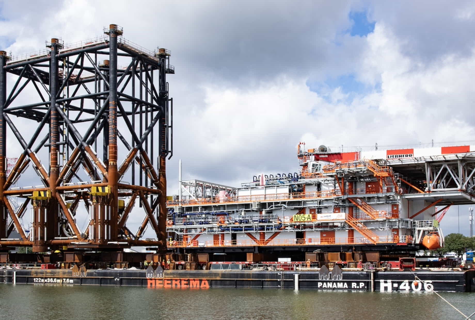 Heerema’s barge hauls topside and jacket from Dutch yard for ...